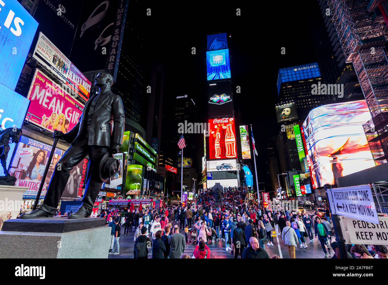 Times Square, a busy and crowded intersection in Manhattan, with many ...