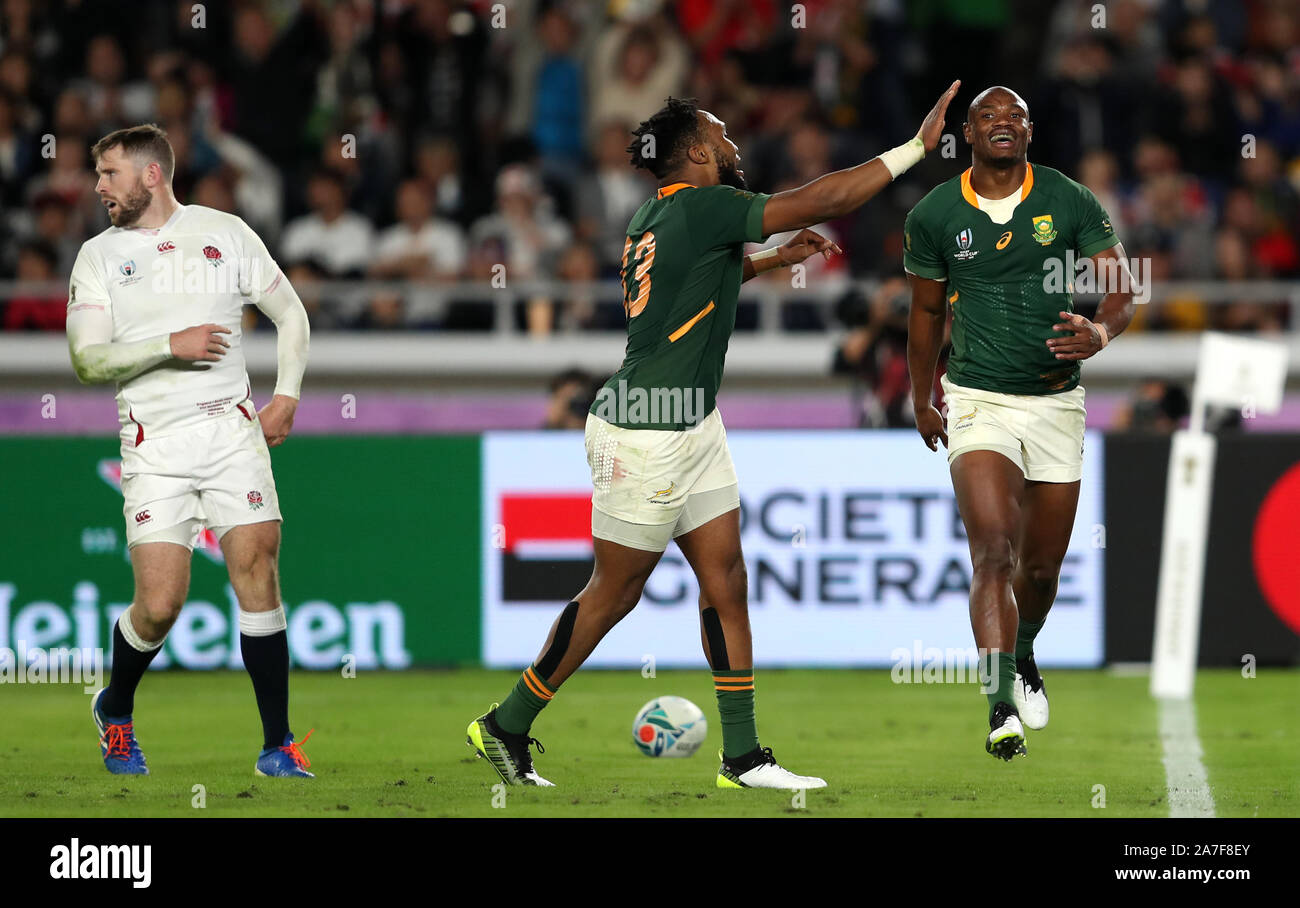 South Africa's Makazole Mapimpi (right) celebrates with scoring his ...