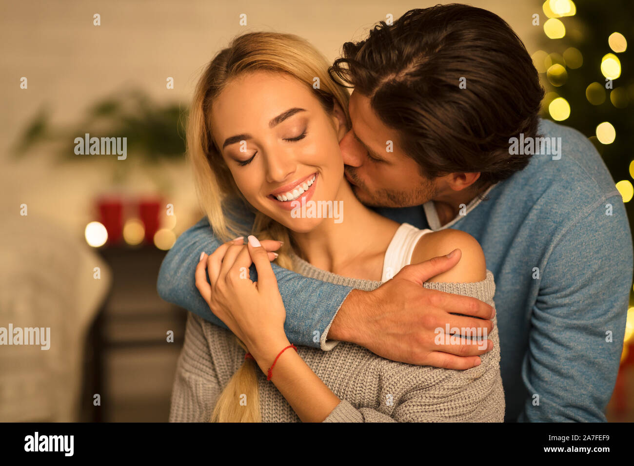 Man kissing woman neck hi-res stock photography and images - Alamy