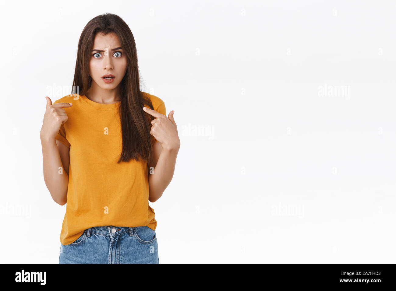 Shocked uneasy and concerned young woman gasping speechless and nervous ...