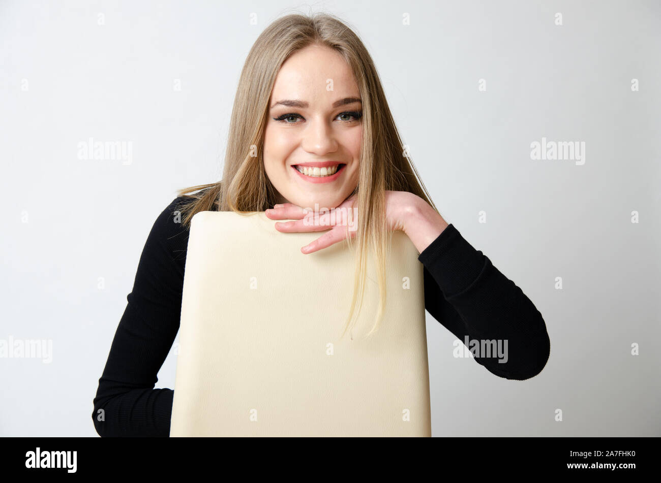 Young female model from Poland posing in studio. Girl with cute smile ...