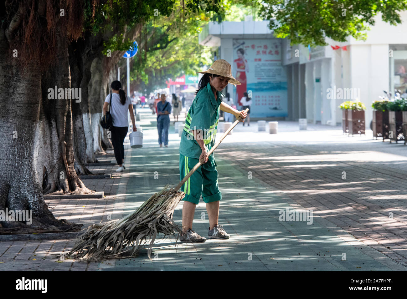 Female road sweeper hi-res stock photography and images - Alamy