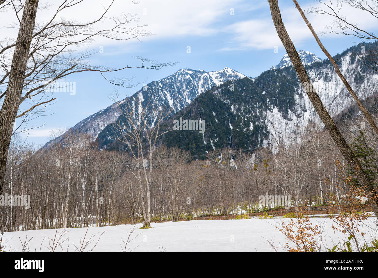 Mountain peak with snow view on hiking trail in Okuhida villages ...