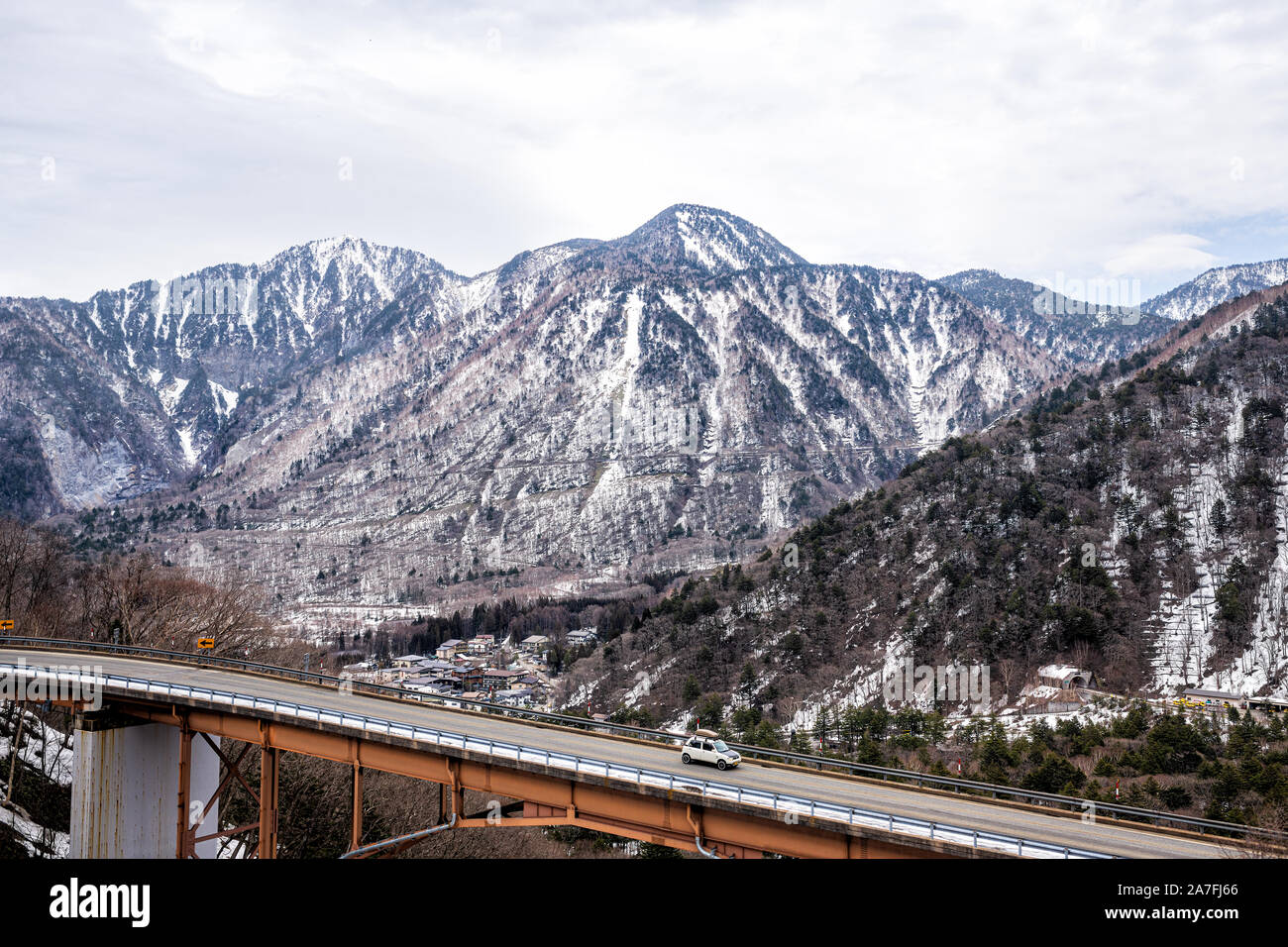 Takayama, Japan aerial view of bridge and car on road in early spring ...
