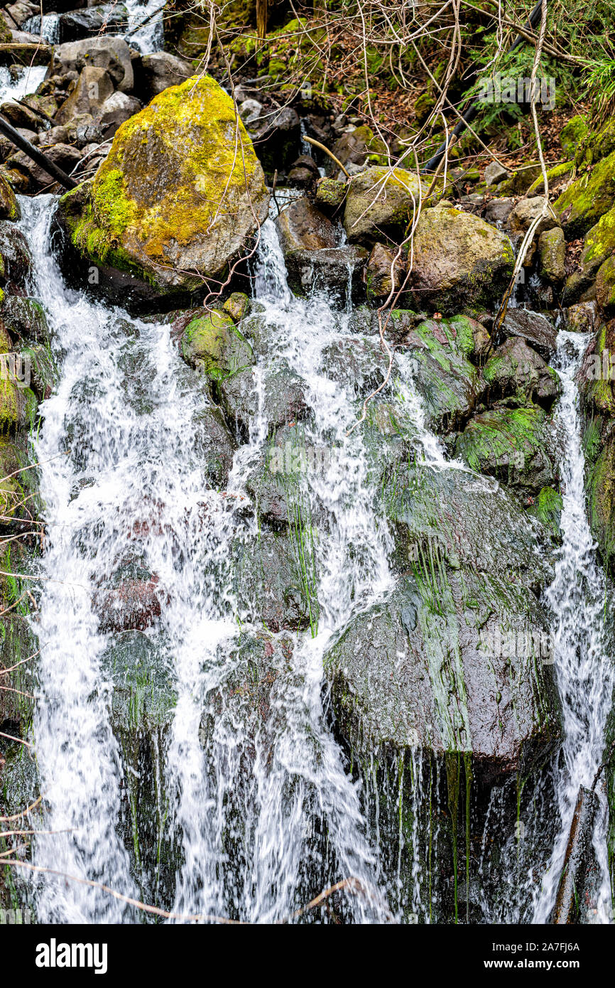 Abstract closeup of rock waterfall water falling in Okuhida villages ...
