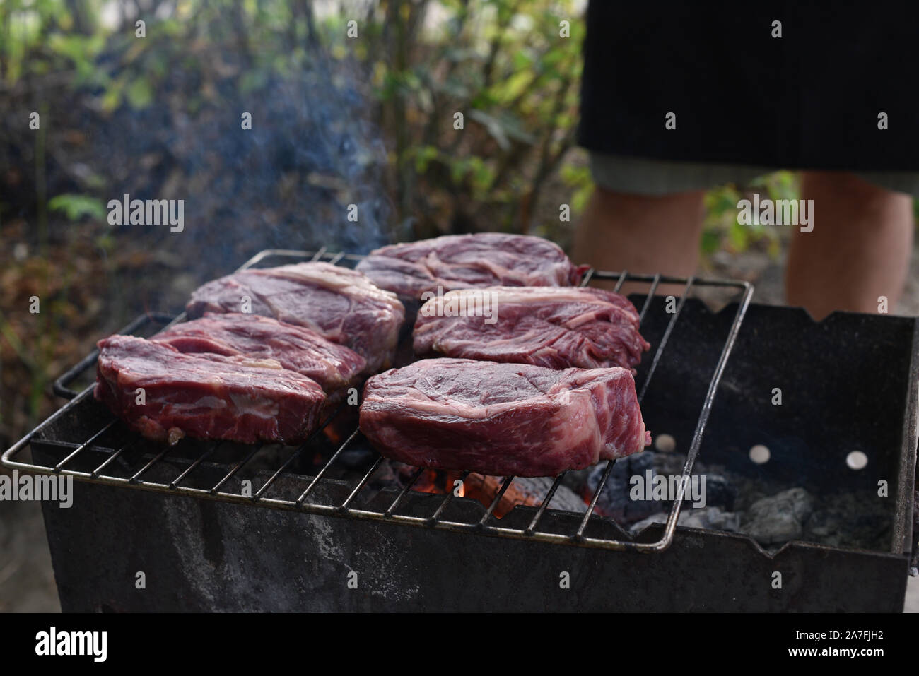 Chuck roll steak. grilled chuck roll. Cooking meat by a professional ...