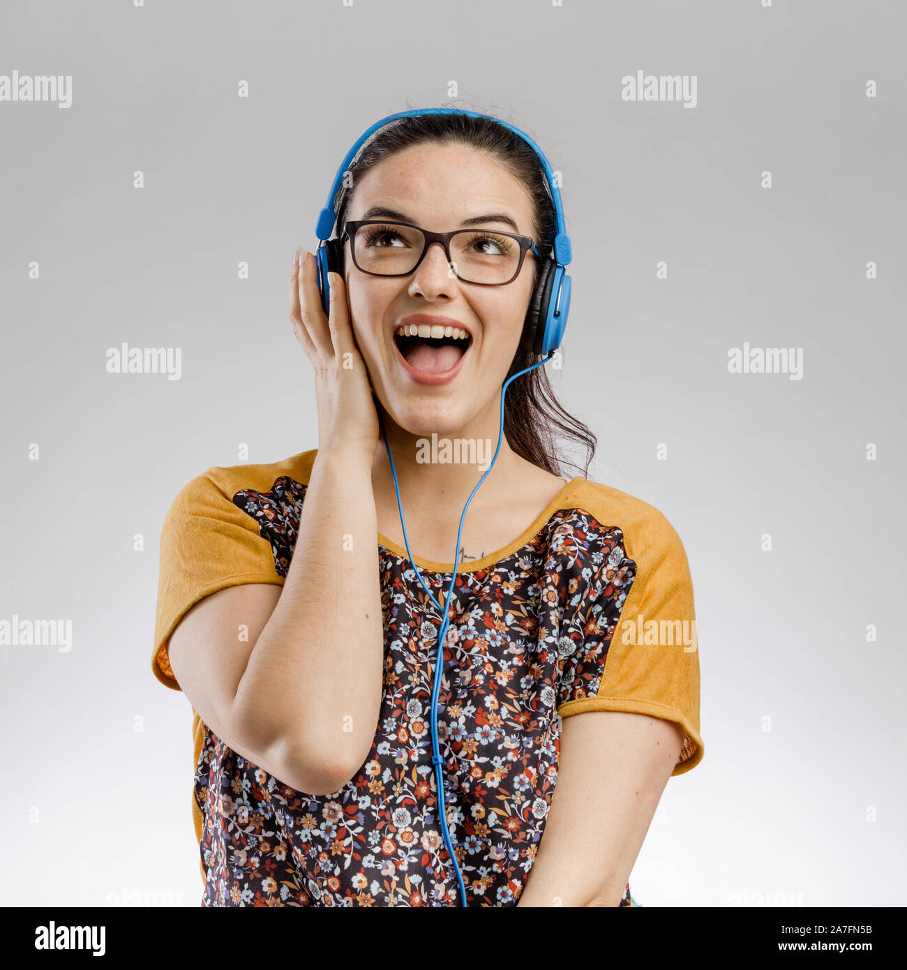 Portrait of beautilful woman listen music with headphones Stock Photo ...