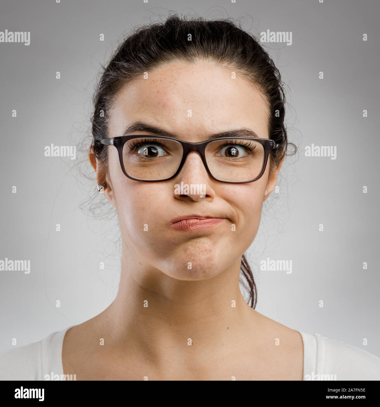 Cute portrait of a woman making a silly face Stock Photo - Alamy