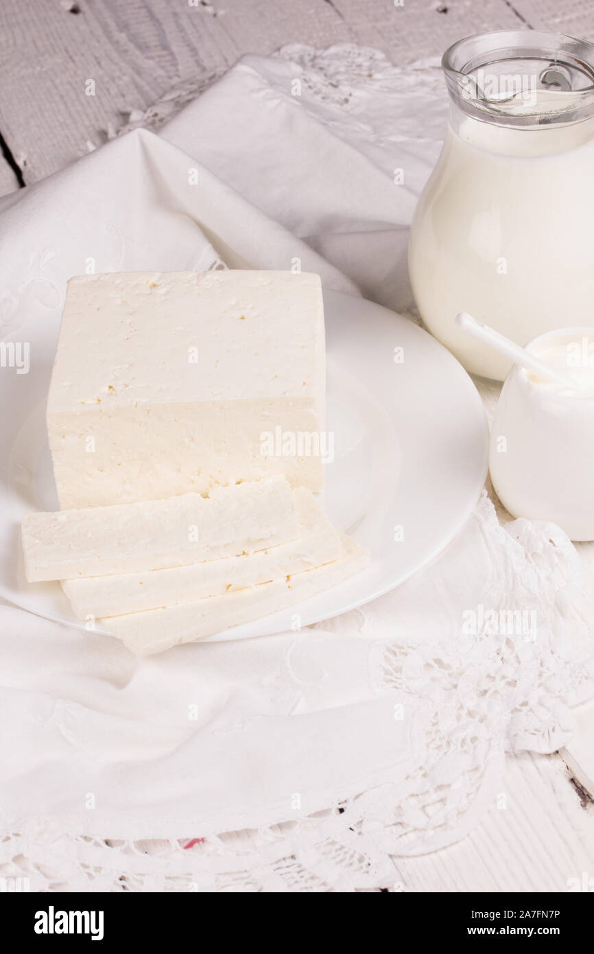 fresh sour cream and quark on a white table Stock Photo - Alamy