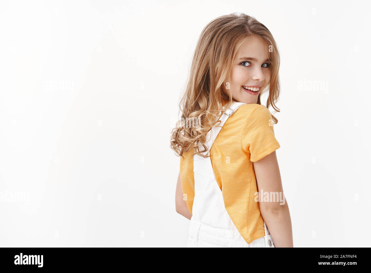 Child smile sly look in camera hi-res stock photography and images - Alamy