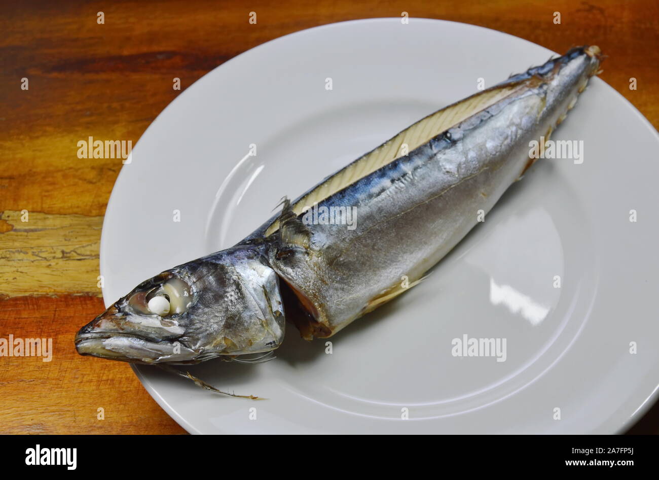 steamed Saba fish skin on plate Stock Photo - Alamy
