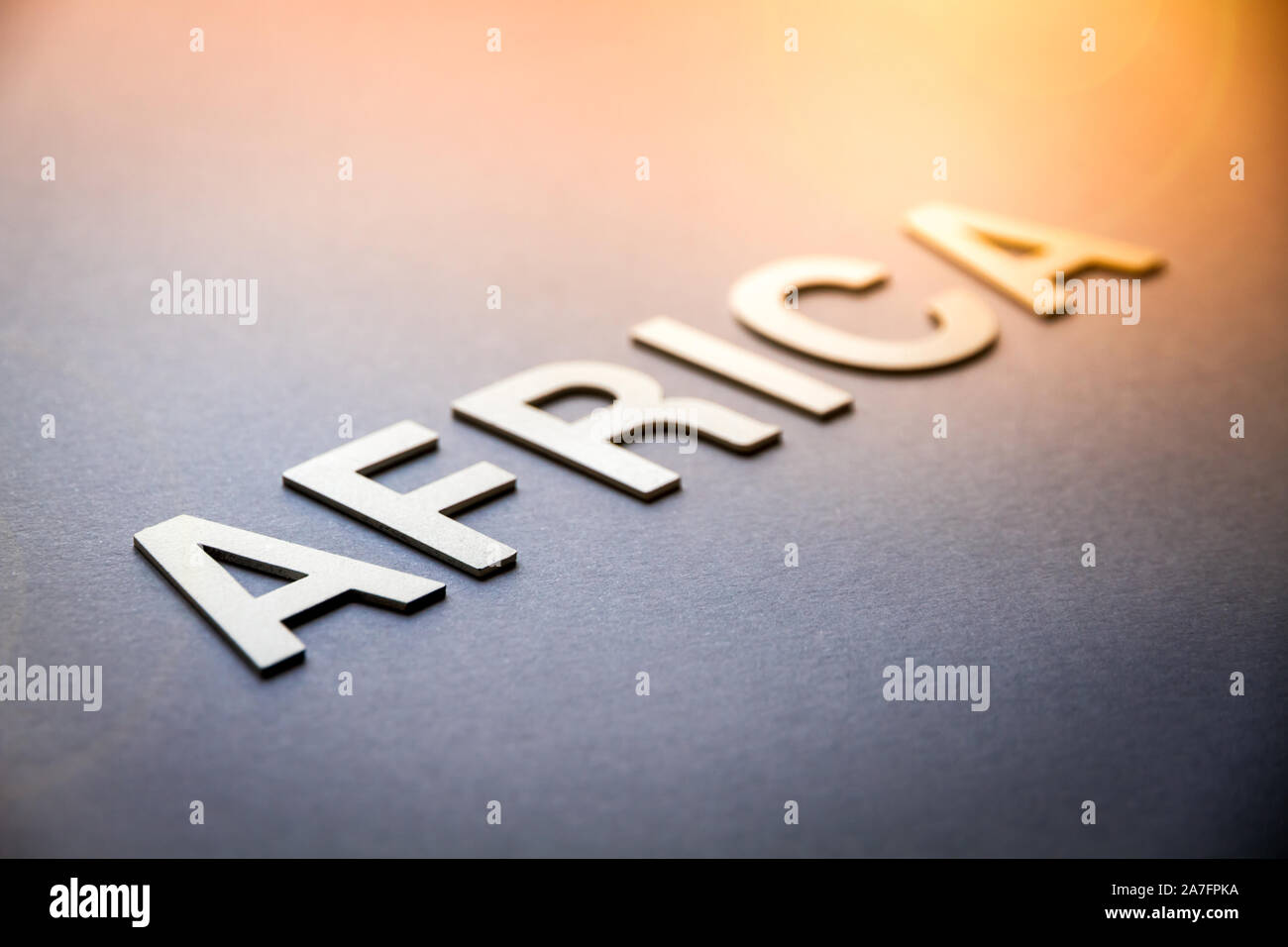 Word Africa written with white solid letters on a board Stock Photo - Alamy