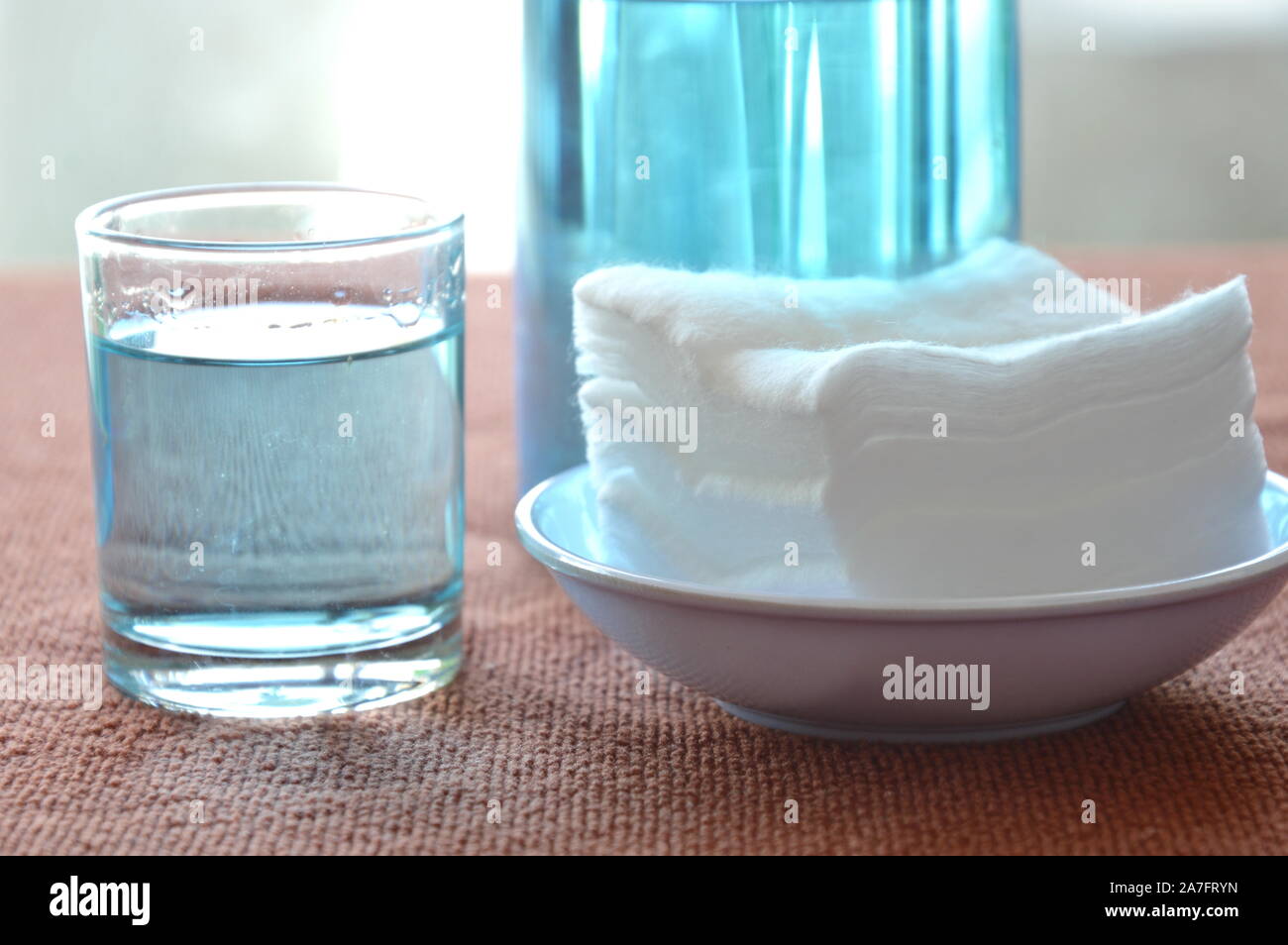 blue alcohol for wash wound in glass and cotton Stock Photo - Alamy