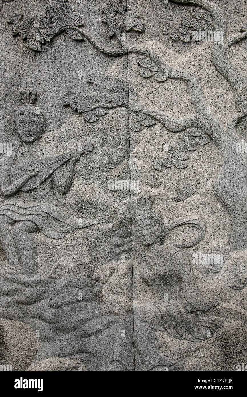 Bas-relief on one of the walls Bomunsa Buddhist Temple, Jeju island ...