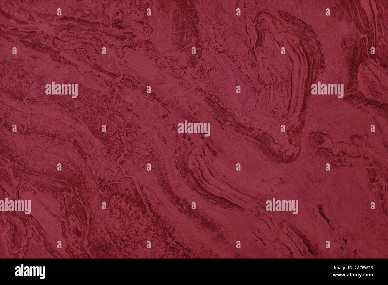 Dark red colored low contrast marble textured background with roughness ...