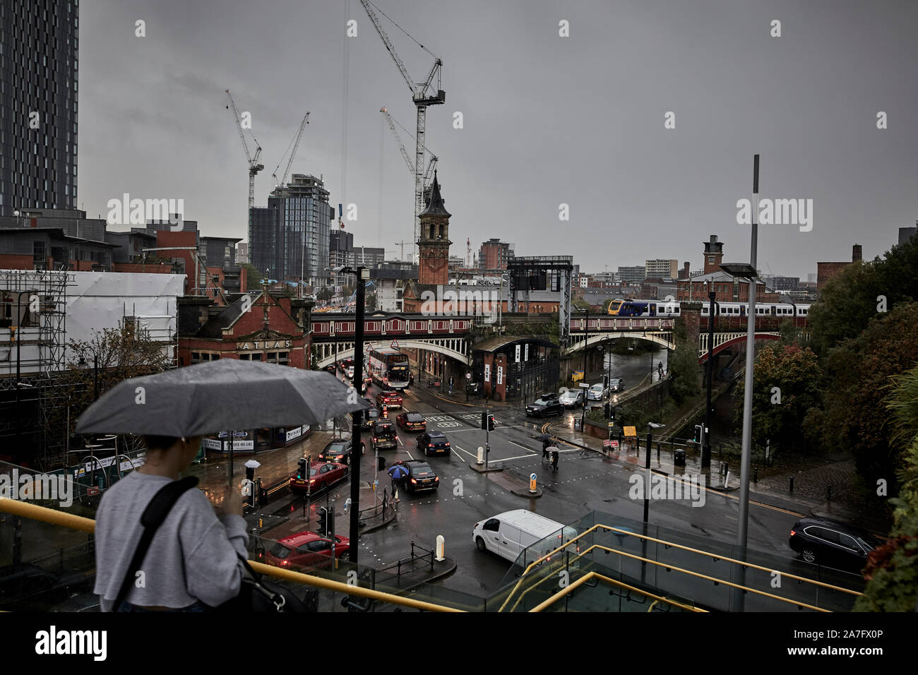 manchester Deansgate, Whitworth Street junction in the rain Stock Photo ...