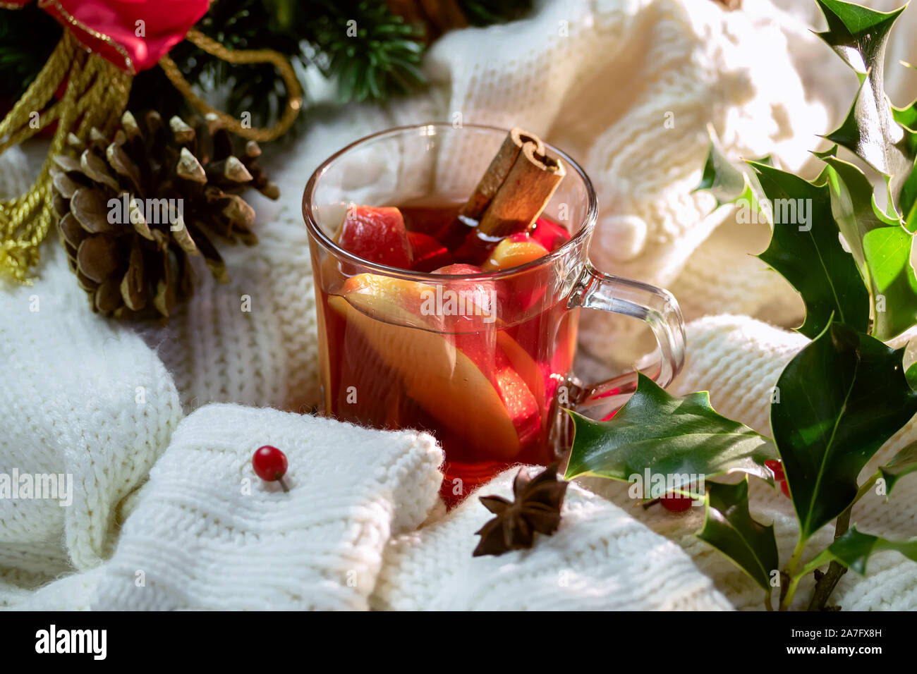 Hot punch, warm sweater and Christmas decorations Stock Photo - Alamy