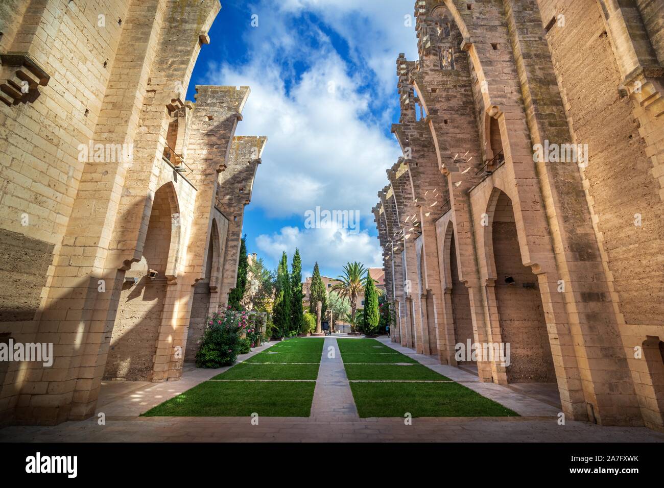 Esgesia Nova Spanish church without roof, entrnce of palm trees leading ...