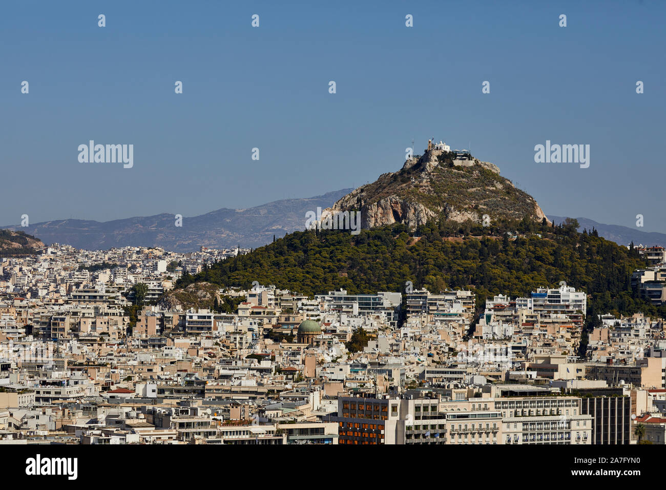 Athens capital of Greece Lykavittos Hill in the middle of the condensed ...