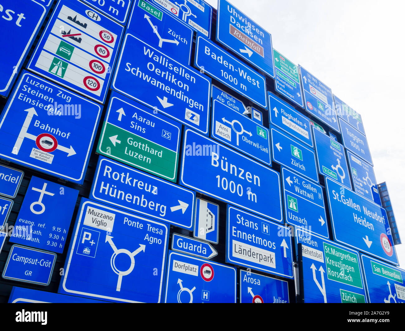 Many discarded traffic signs are hanging as decoration outside the ...