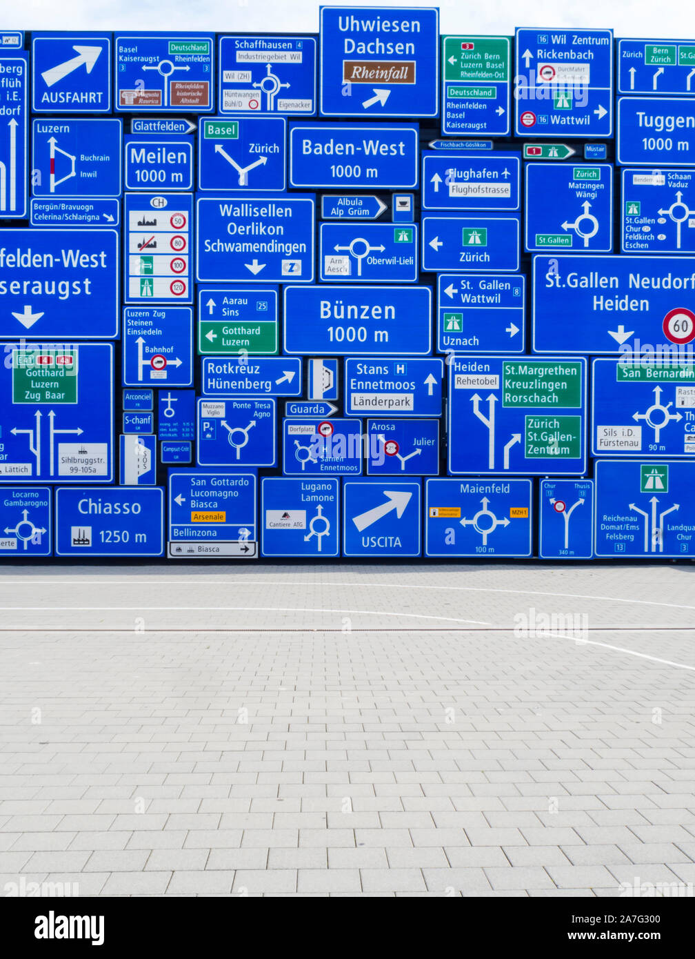 Many discarded traffic signs are hanging as decoration outside the ...