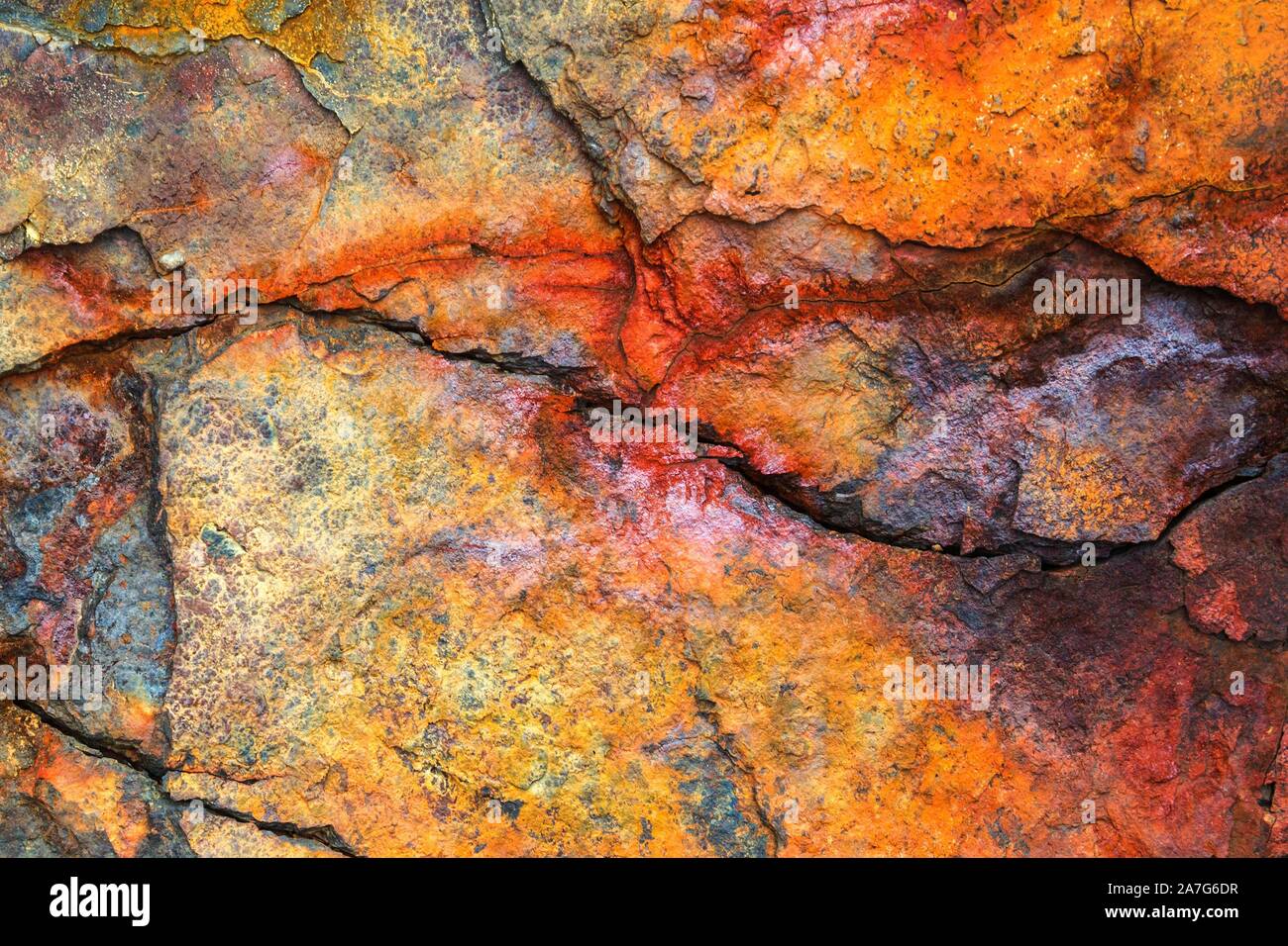 Colourful rust on a ferrous rock, Iceland Stock Photo - Alamy