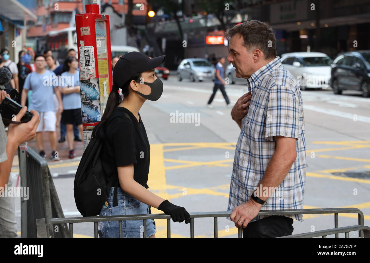 Black clad protesters hi-res stock photography and images - Alamy