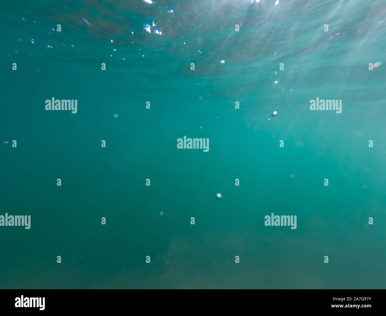 Crystal clear turquoise water surface hi-res stock photography and ...