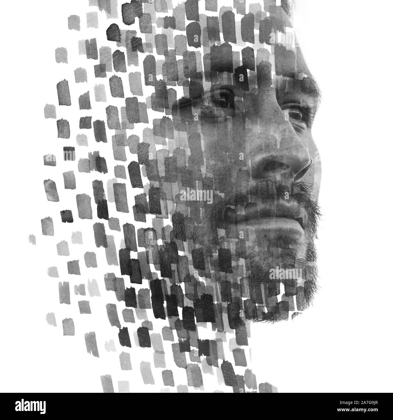 Paintography. Double exposure close up portrait of a serious male model ...