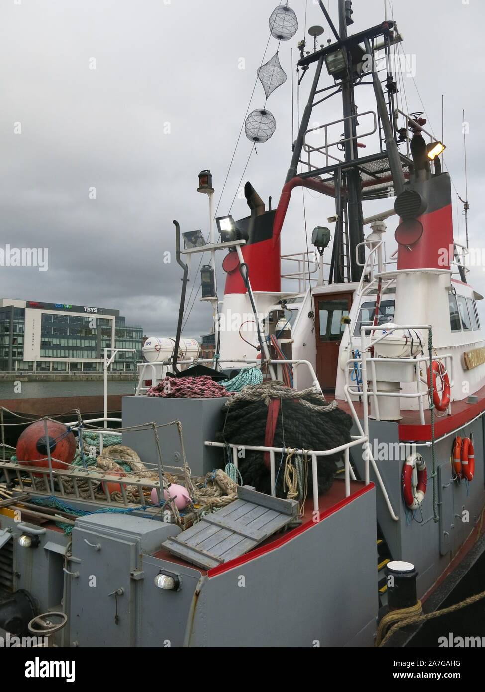 The tug boat "Goliath" moored at a jetty in Belfast harbour; it has ...