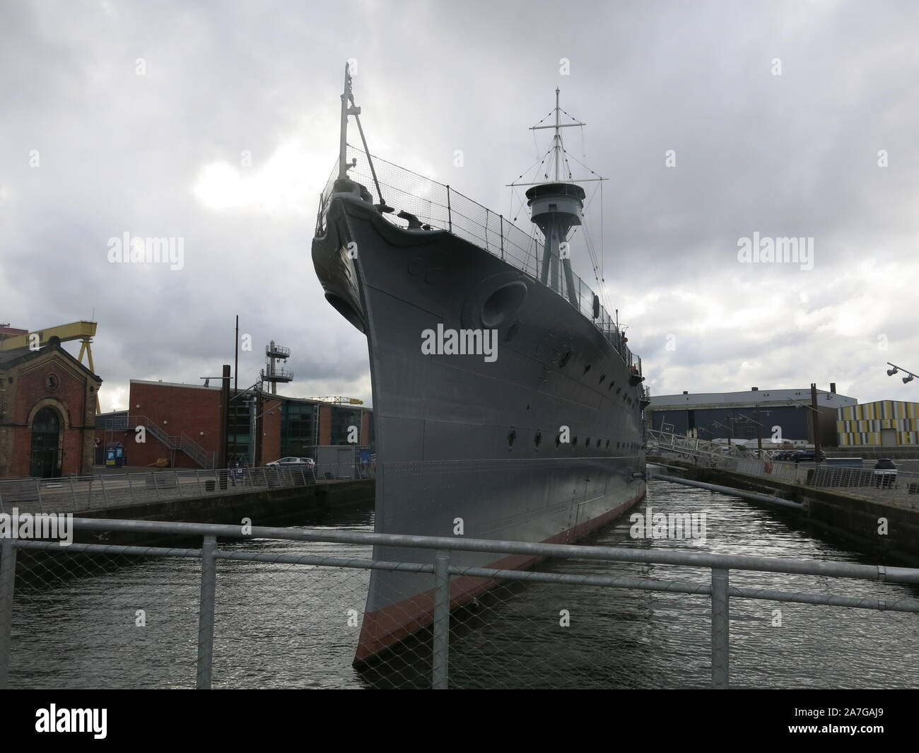 A view of HMS Caroline moored in Alexandra Dock, a heritage tourist ...