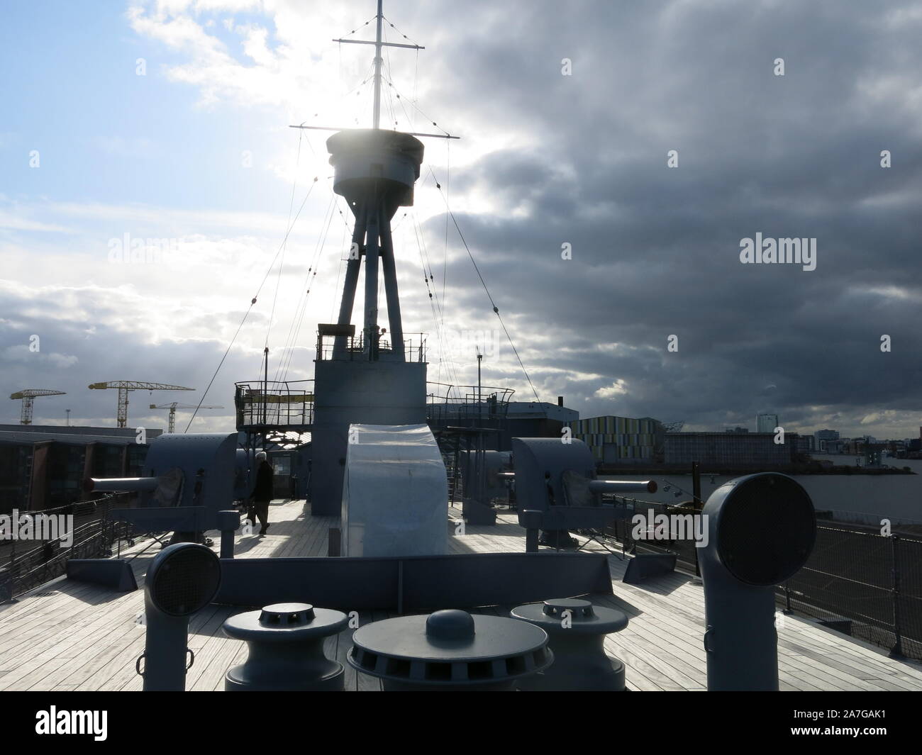 View on board the HMS Caroline looking back along the deck towards the ...