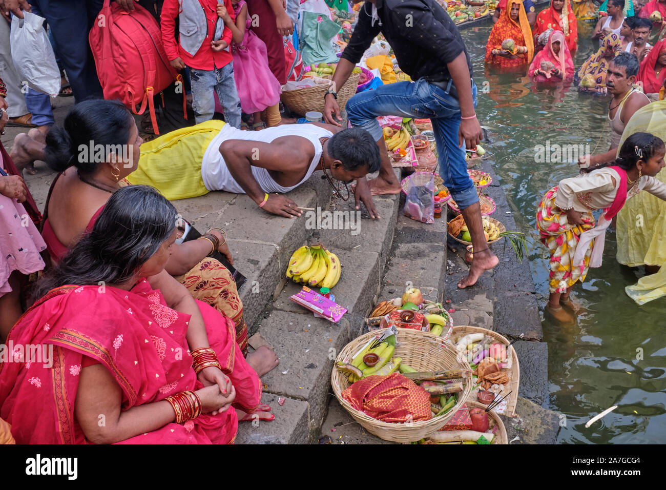 During Chhath Puja festival, a Hindu man crawls on his belly to perform ...