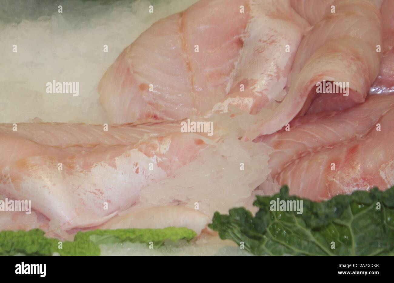Fresh Italian sea fish with ice background image Stock Photo - Alamy