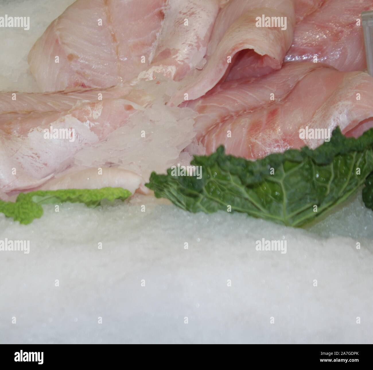 Fresh Italian sea fish with ice background image Stock Photo - Alamy