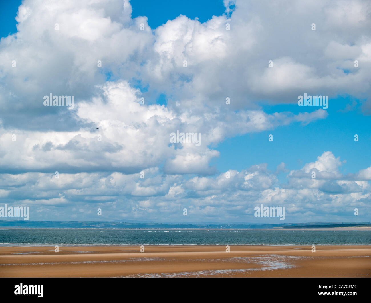 Low flying trainer jet over Whiteford sands, looking Northwest towards ...