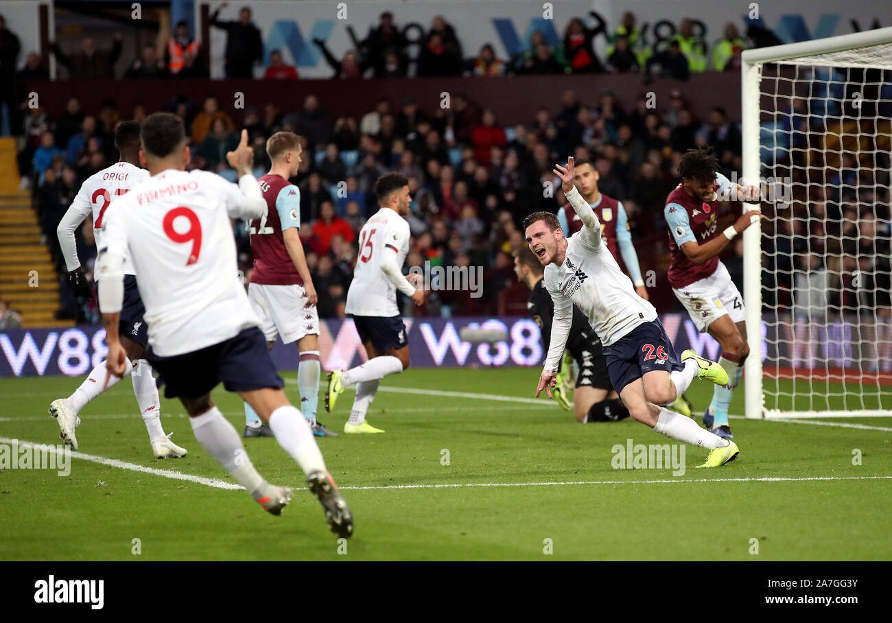 Liverpool's Andrew Robertson celebrates scoring his side's first goal ...