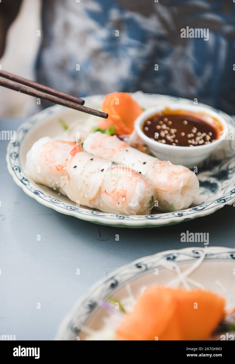 Man eating rice paper hi-res stock photography and images - Alamy