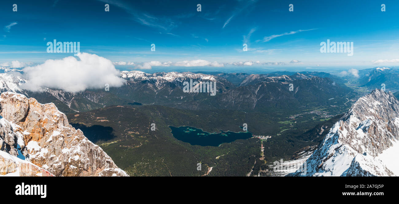 At the top of Zugspitze, highest mountain of Germany, during summer ...