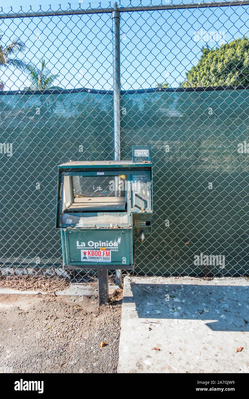 Abandoned coin-operated newspaper machine in poor condition Stock Photo ...