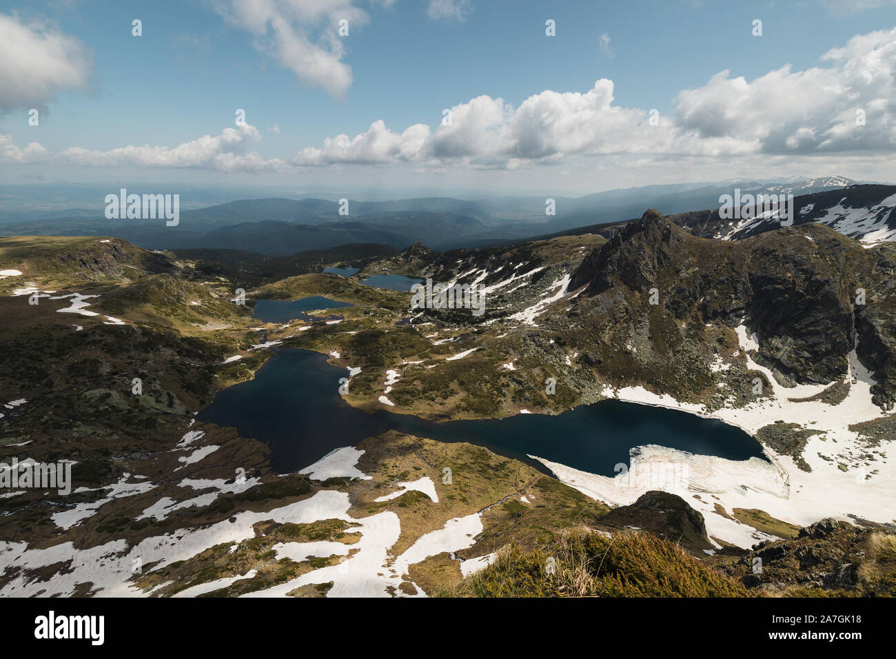 Panorama view of The Seven Rila Lakes as seen from Mount Ezere covered ...