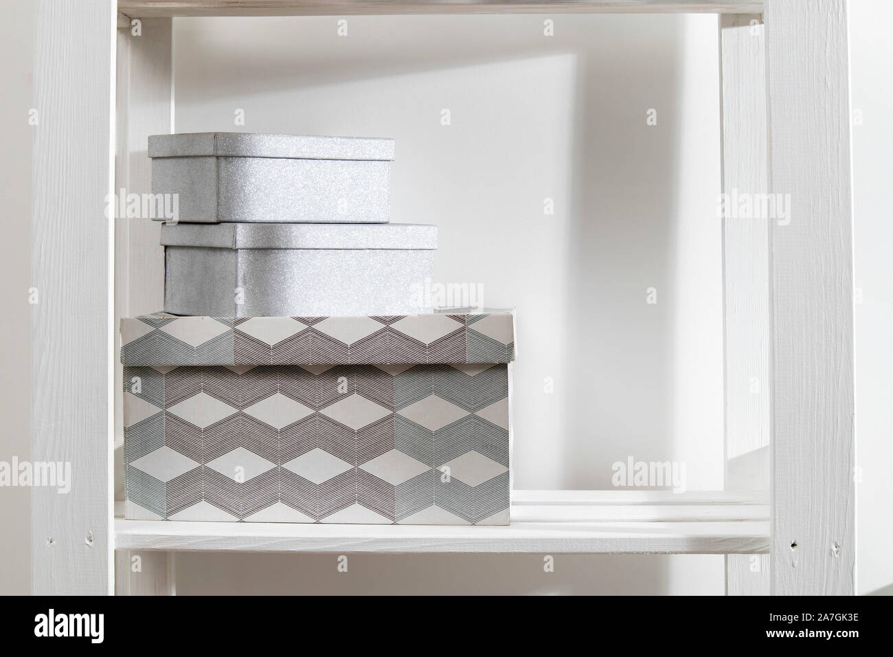 Storage system in the kitchen. Shelving with boxes Stock Photo - Alamy