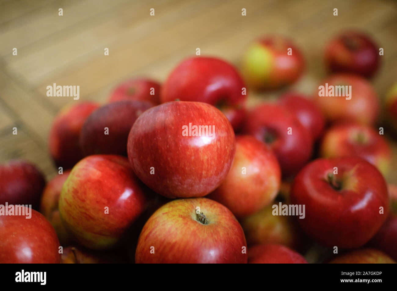 Sweet ripe red juicy apples on wooden background, healthy eating and ...