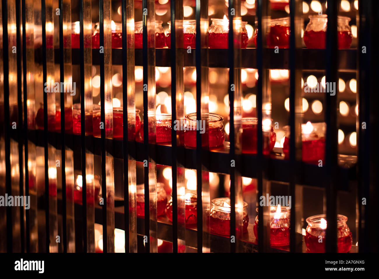 Large number of Candles lightened in a temple Stock Photo - Alamy