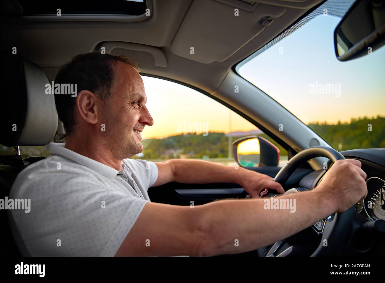 Driver behind wheel of car hi-res stock photography and images - Alamy