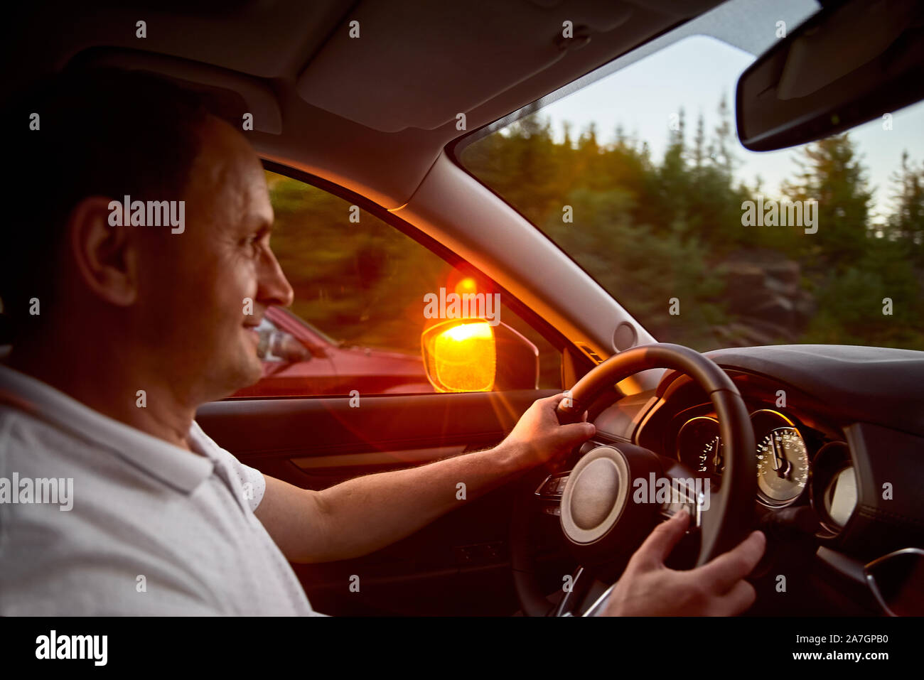 Driver behind wheel of car hi-res stock photography and images - Alamy