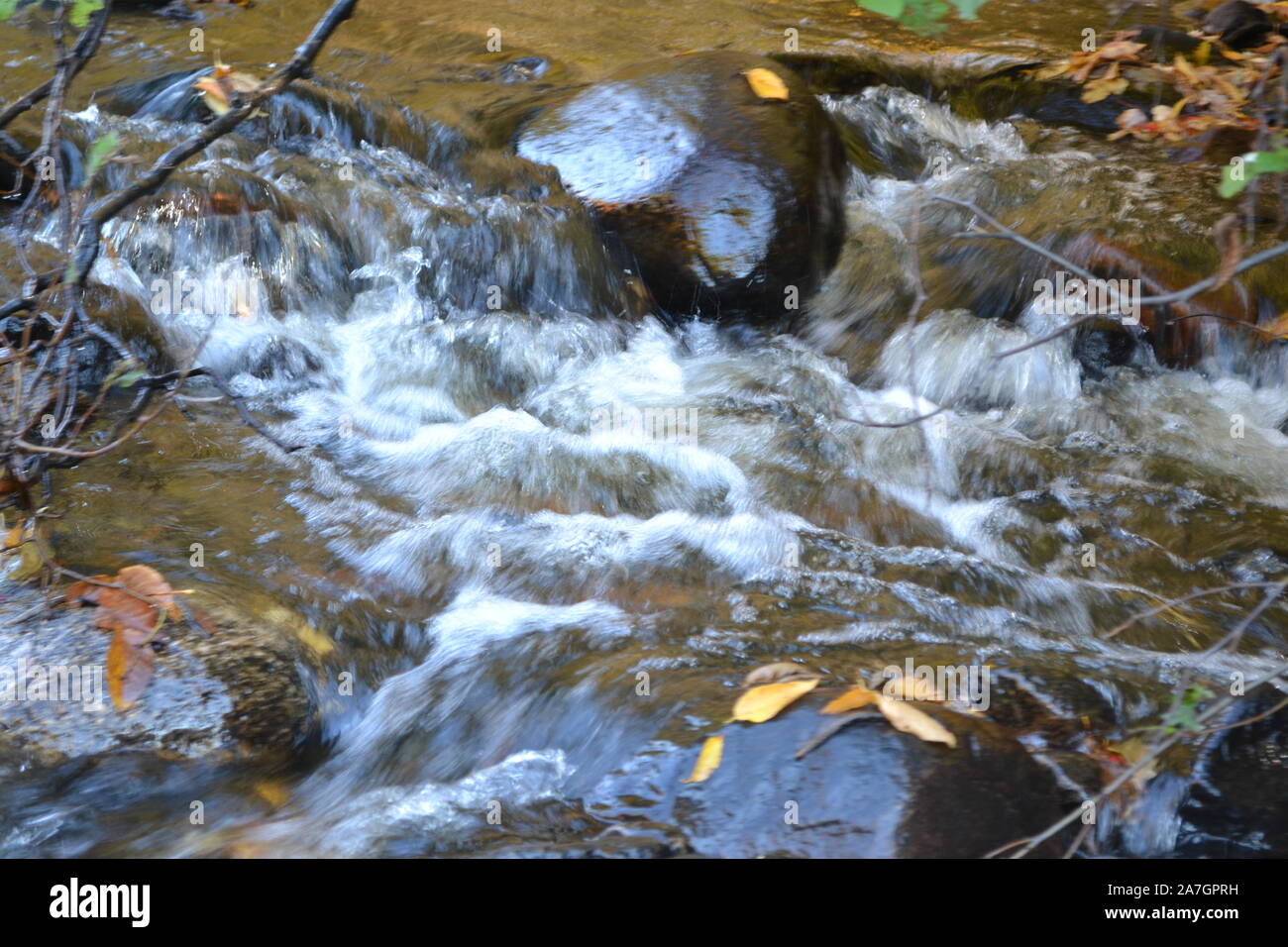 Autumn scene on small river Stock Photo - Alamy