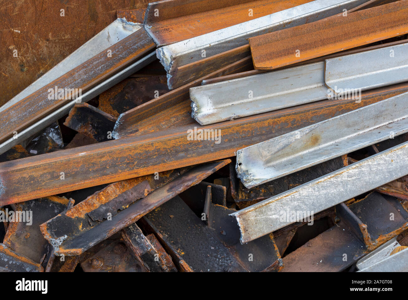 Scrap metal steel bars and beams ready for recycling Stock Photo - Alamy