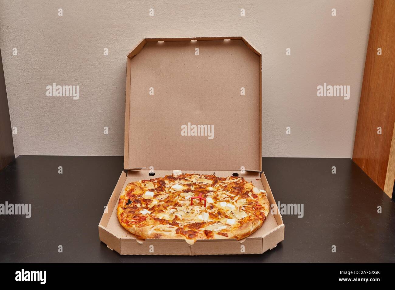Whole pizza in a box Stock Photo - Alamy
