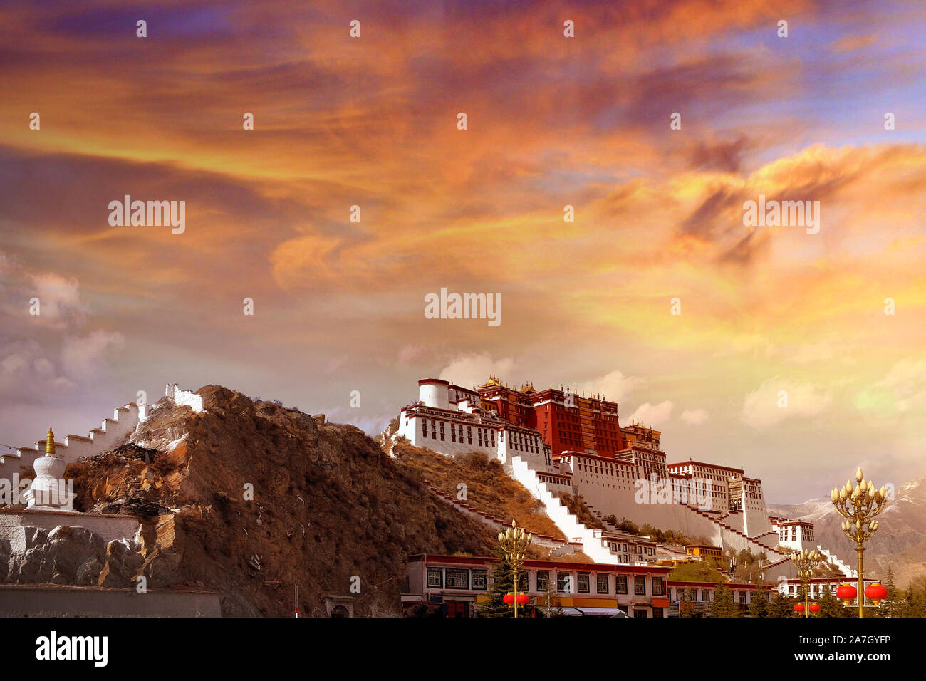 Lateral view of the Potala Palace in Lhasa, Tibet, against a colorful ...